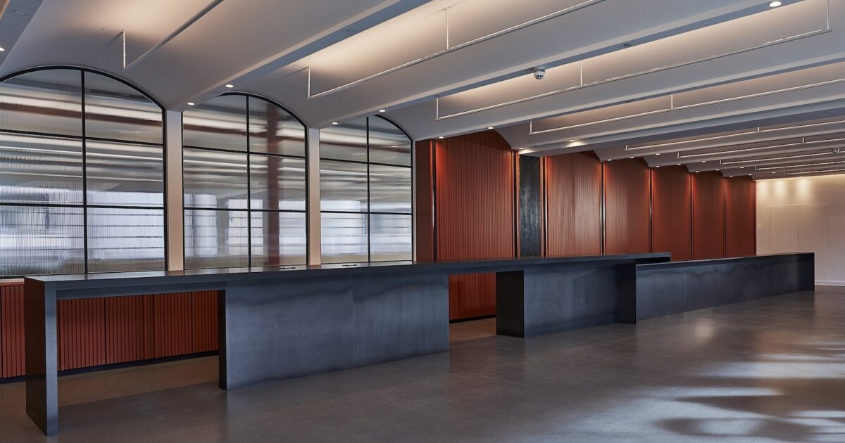 Minimalist reception desk crafted with Richlite… | Surface Matter